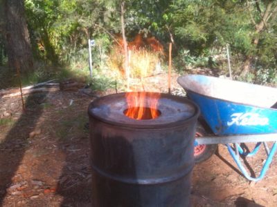 Making Biochar: Building Our First Dome School Biochar Stove - Milkwood ...